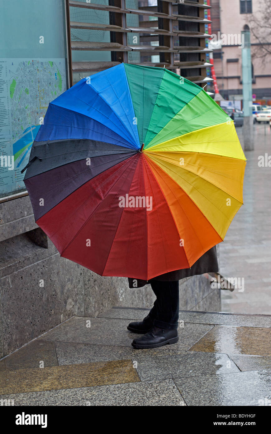 Sheltering from rain hi-res stock photography and images - Alamy
