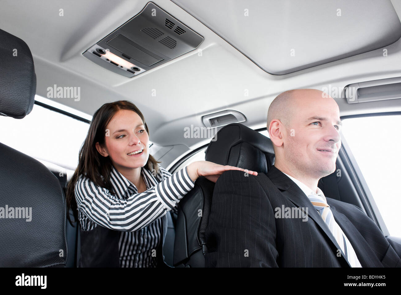 woman in car talking to driver Stock Photo - Alamy