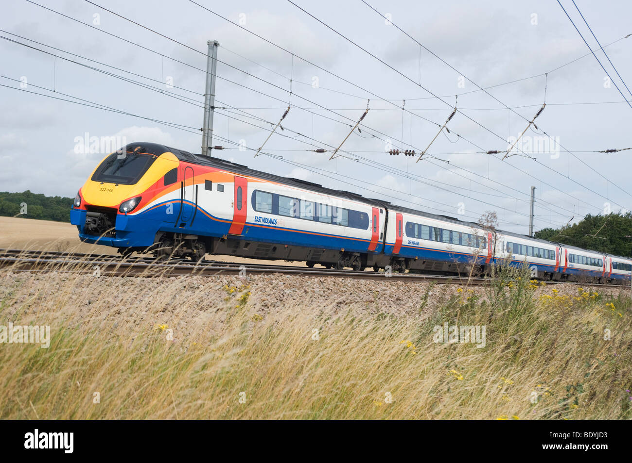Class 222 passenger train in East Midlands Trains livery speeding ...