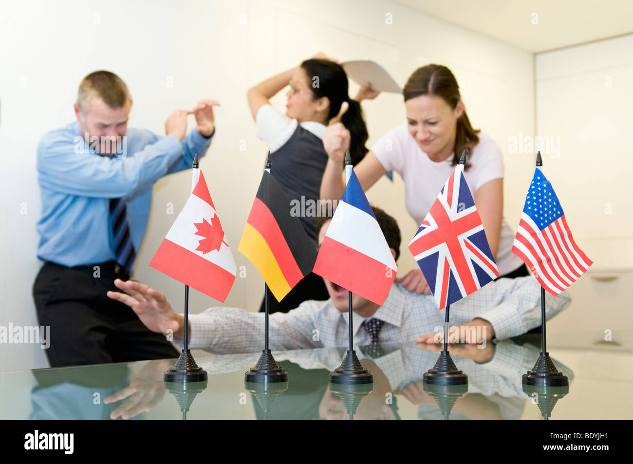 Three business people fighting hi-res stock photography and images - Alamy