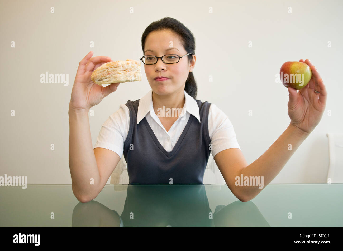 A business woman deciding what to eat Stock Photo - Alamy