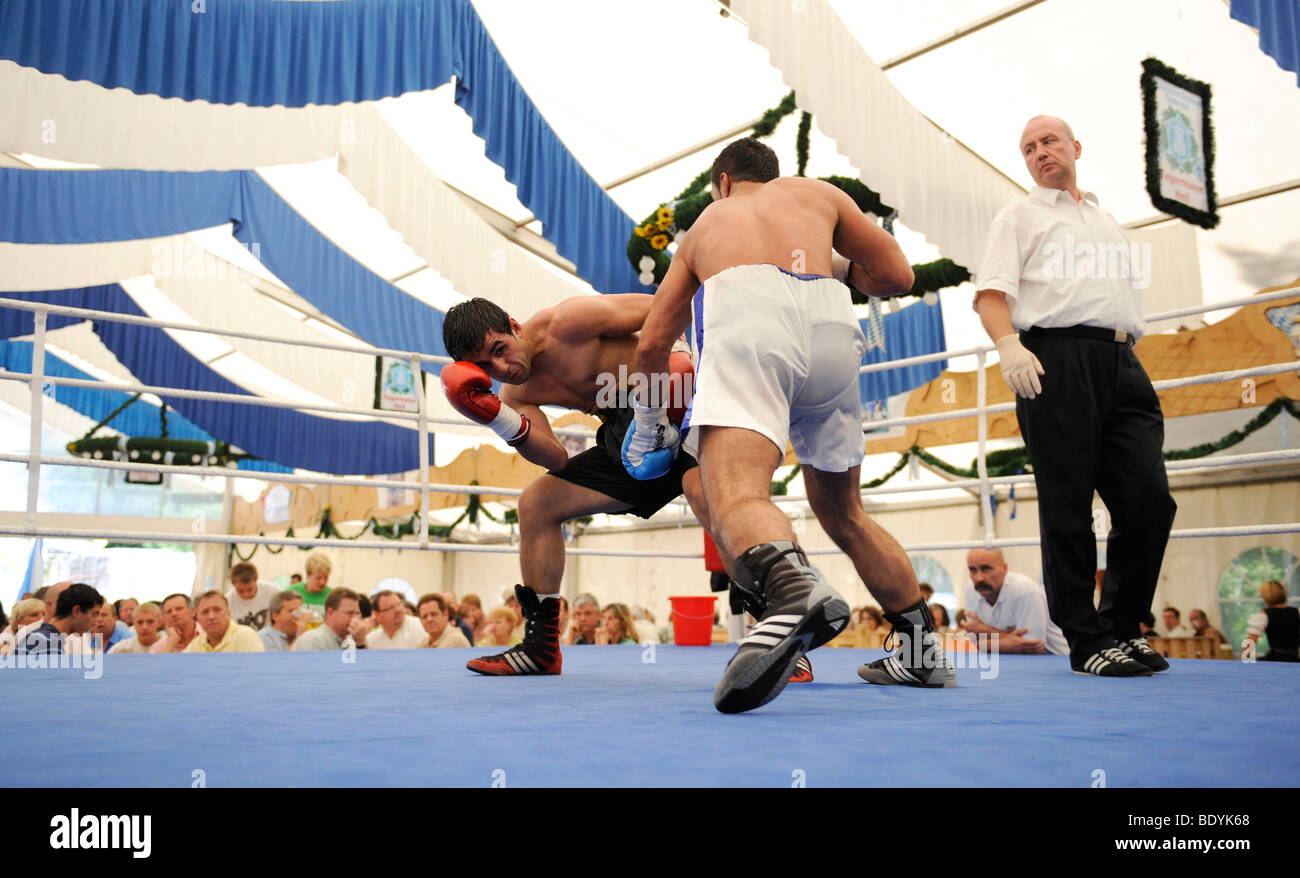 Traditional beer tent boxing at a folk festival in Geretsried, Bavaria ...
