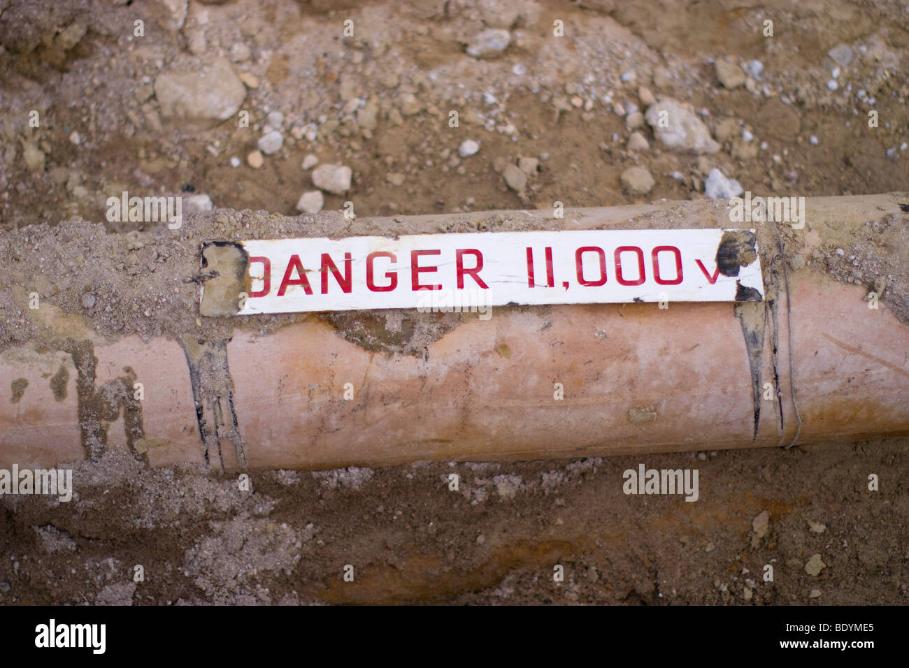 roadworks, underground electrical cable 11,000 volt, 11kV, being dug ...
