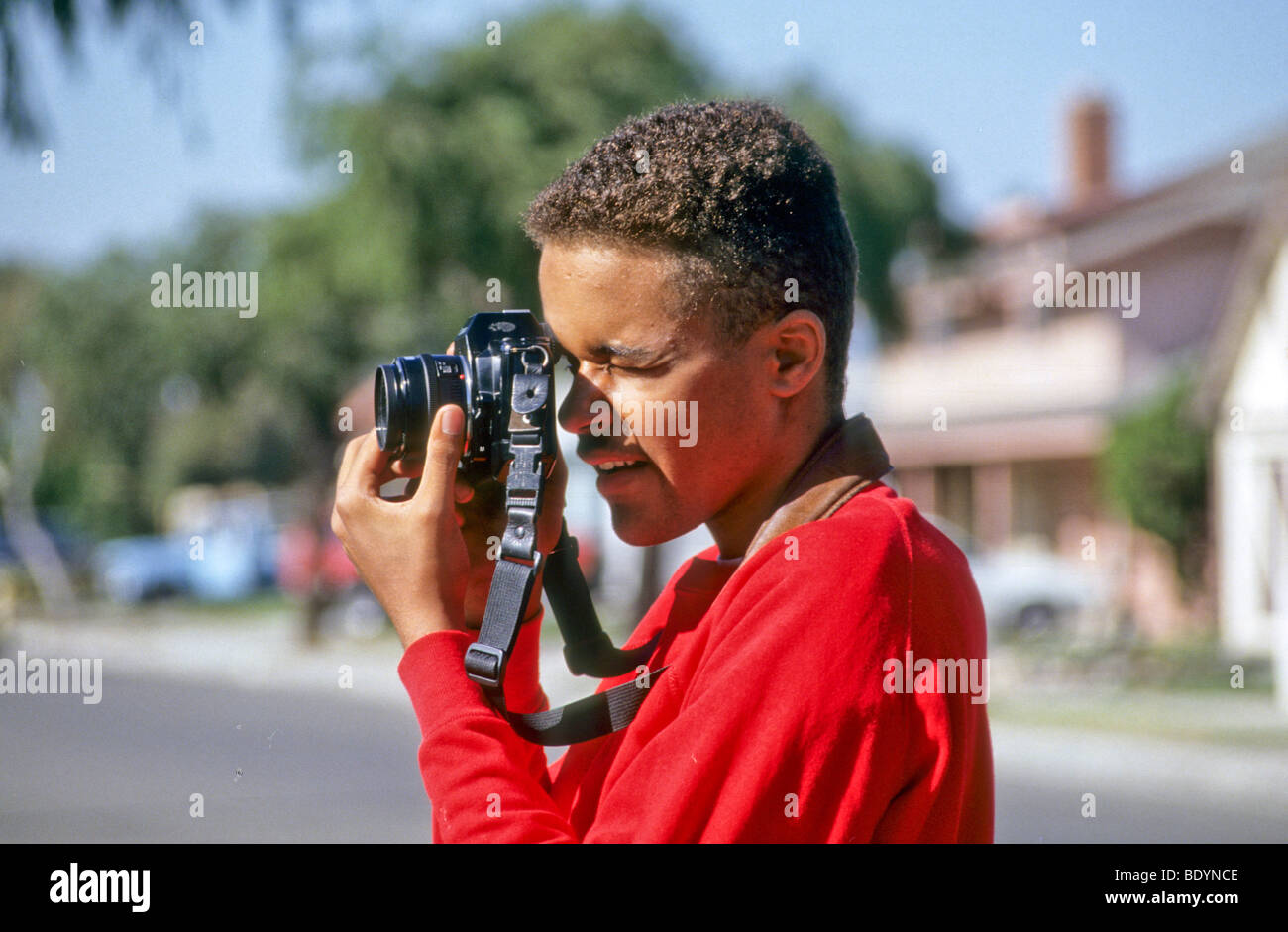 Black male teen picture camera hi-res stock photography and images - Alamy