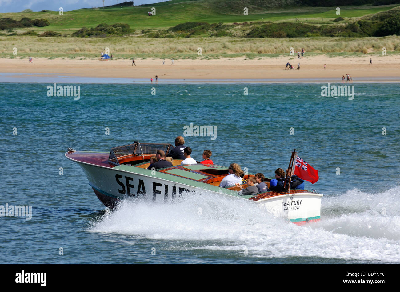 A speed boat taking tourists for a joy ride on the Camel Estuary near ...