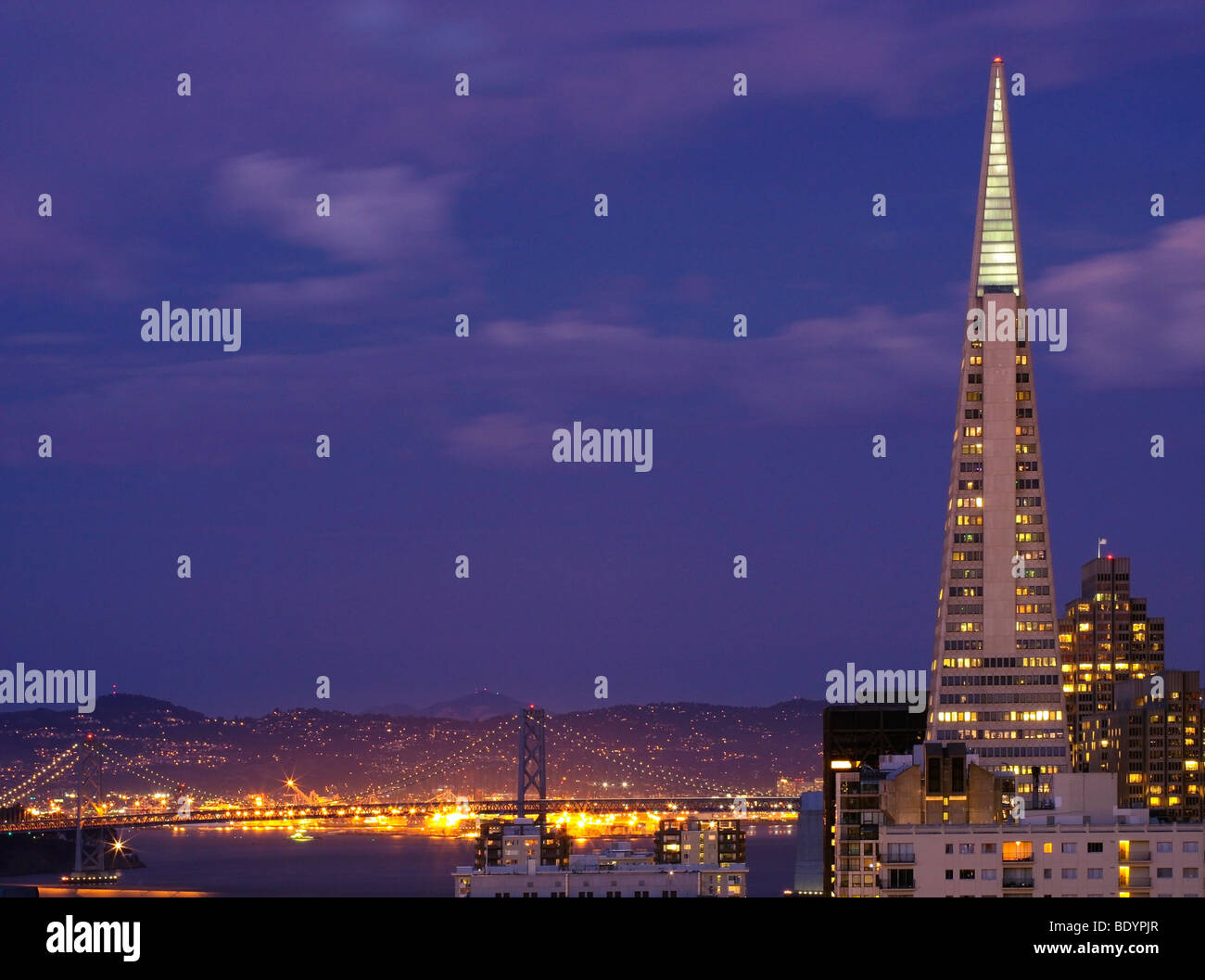 The San Francisco Transamerica pyramid and Bay Bridge at night Stock ...