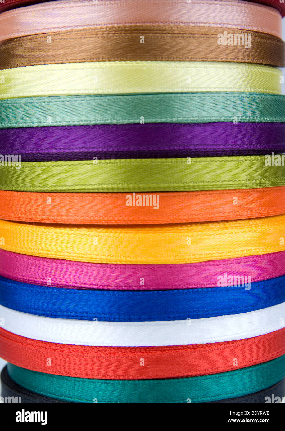 a stack of various colours of ribbon Stock Photo - Alamy