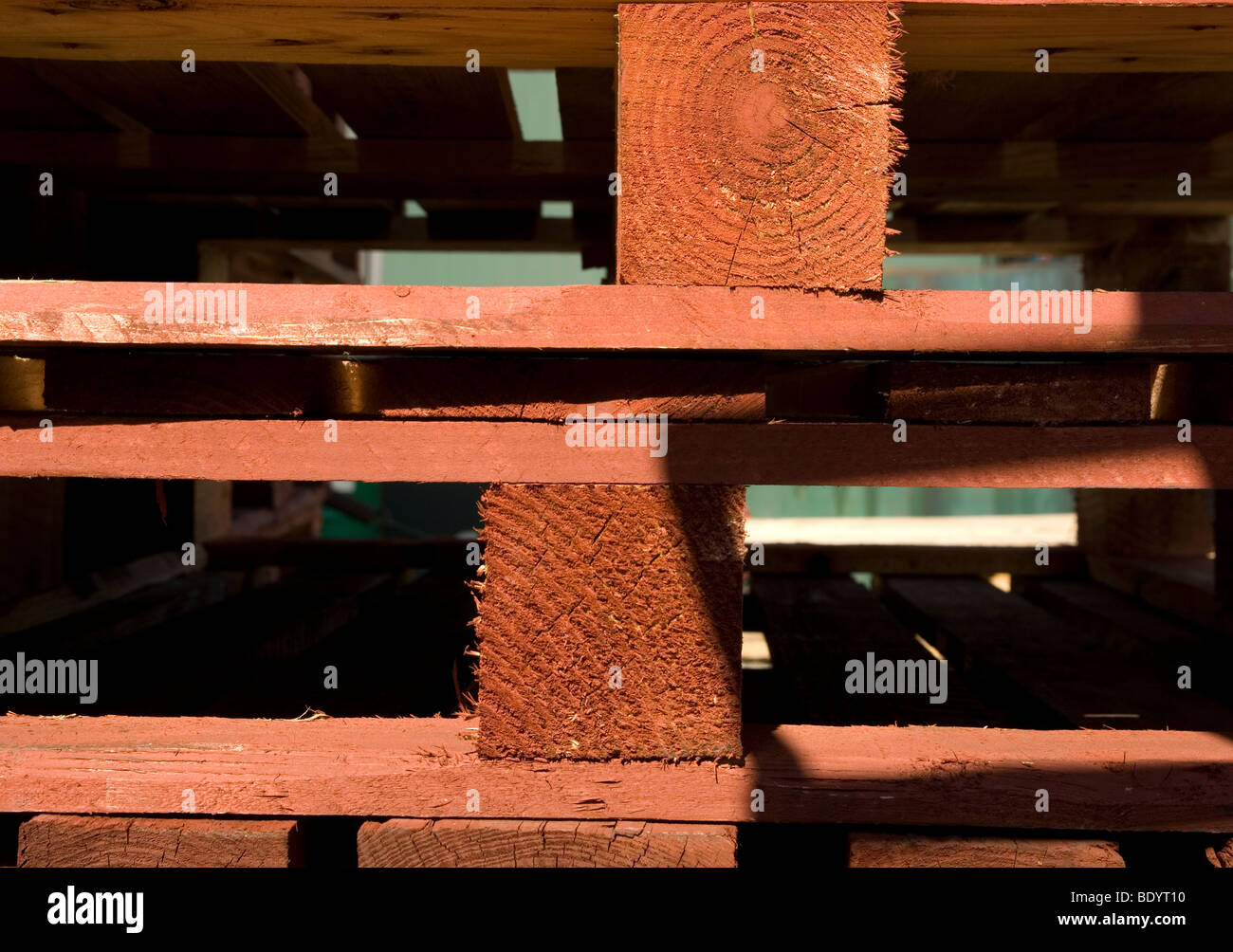 a stack of wooden brown pallets in daylight Stock Photo - Alamy