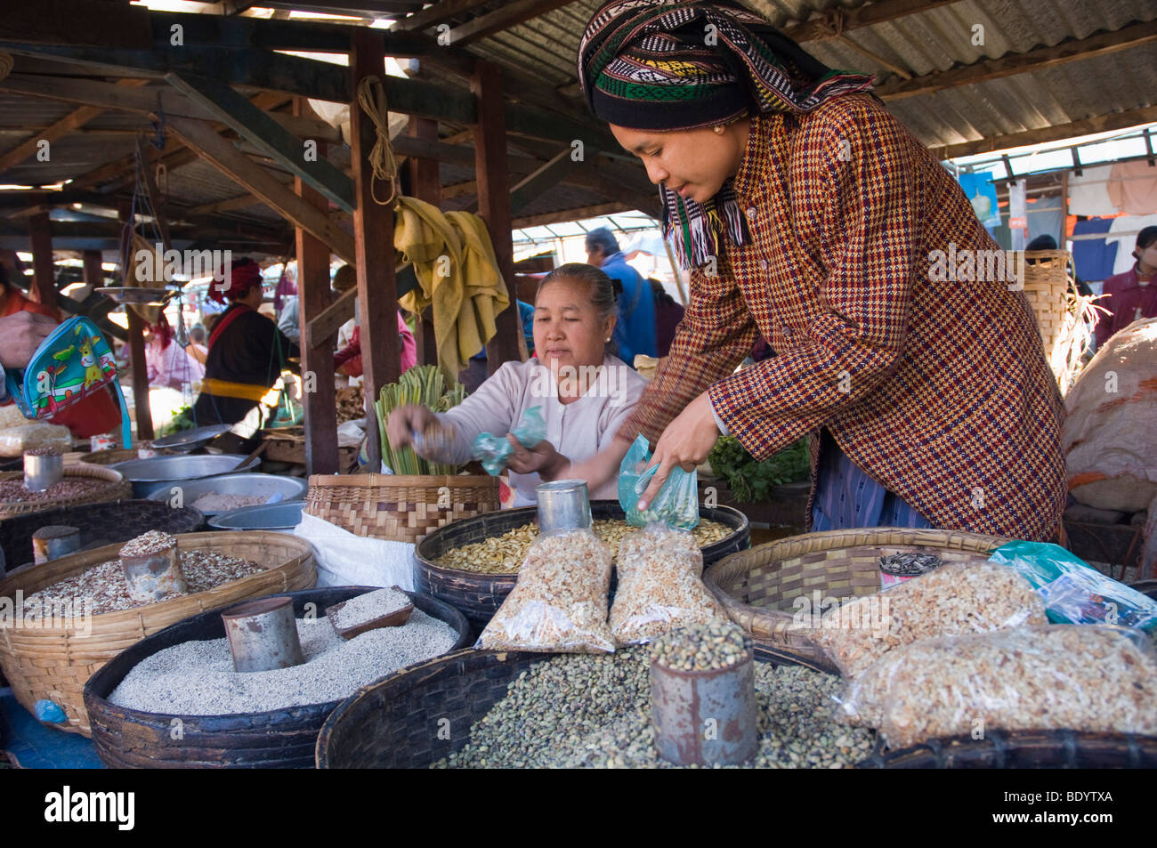 Woman seeling on the Mingalar market in Nyaungshwe, Inle Lake, Shan ...