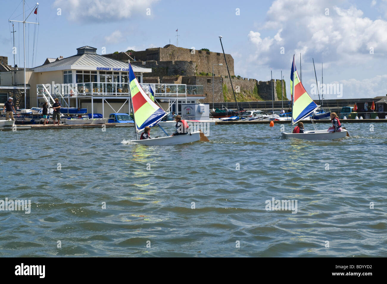 Children playing with sailing boat hi-res stock photography and images ...