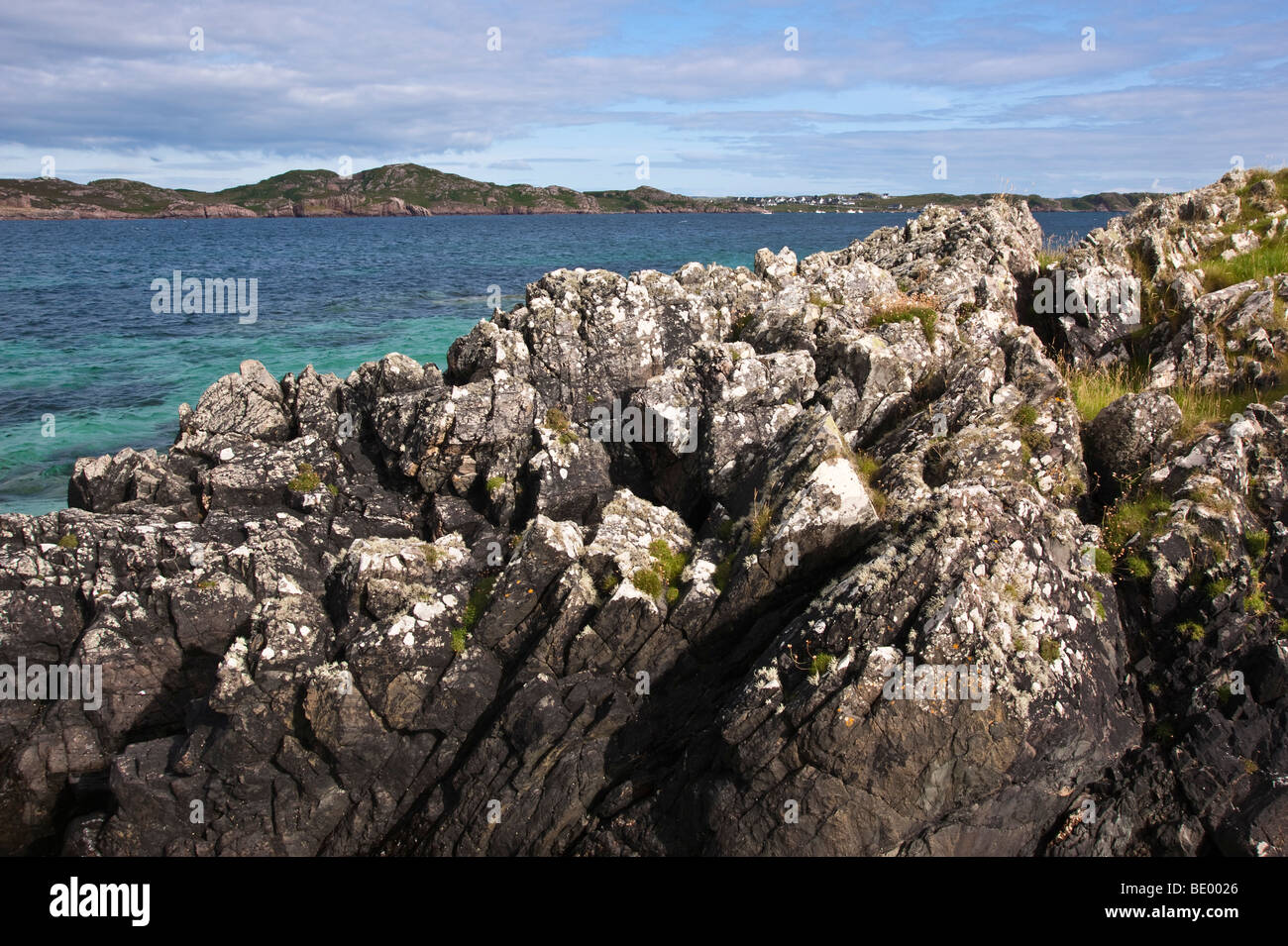 Isle of Iona Scotland - summer rocks sea and sand looking across Sound ...