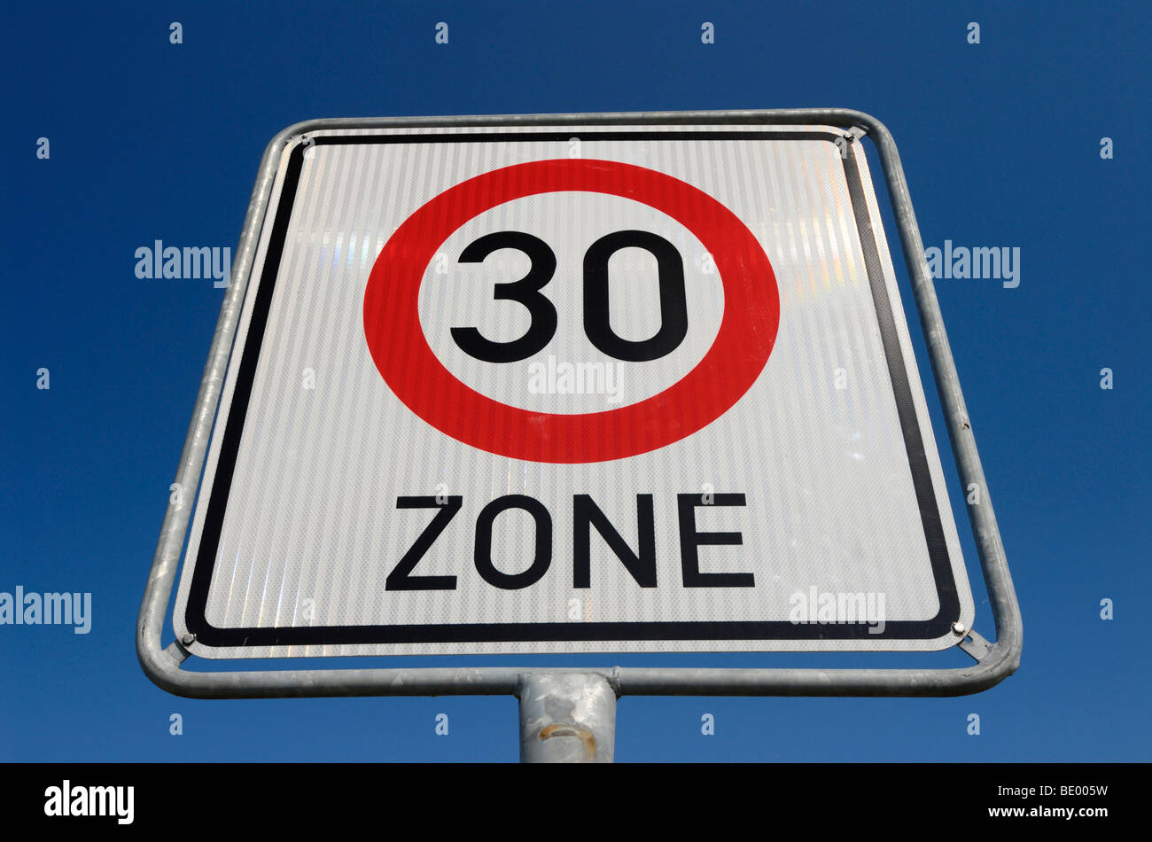 Speed limit sign of a 30 km/h restriction zone Stock Photo - Alamy