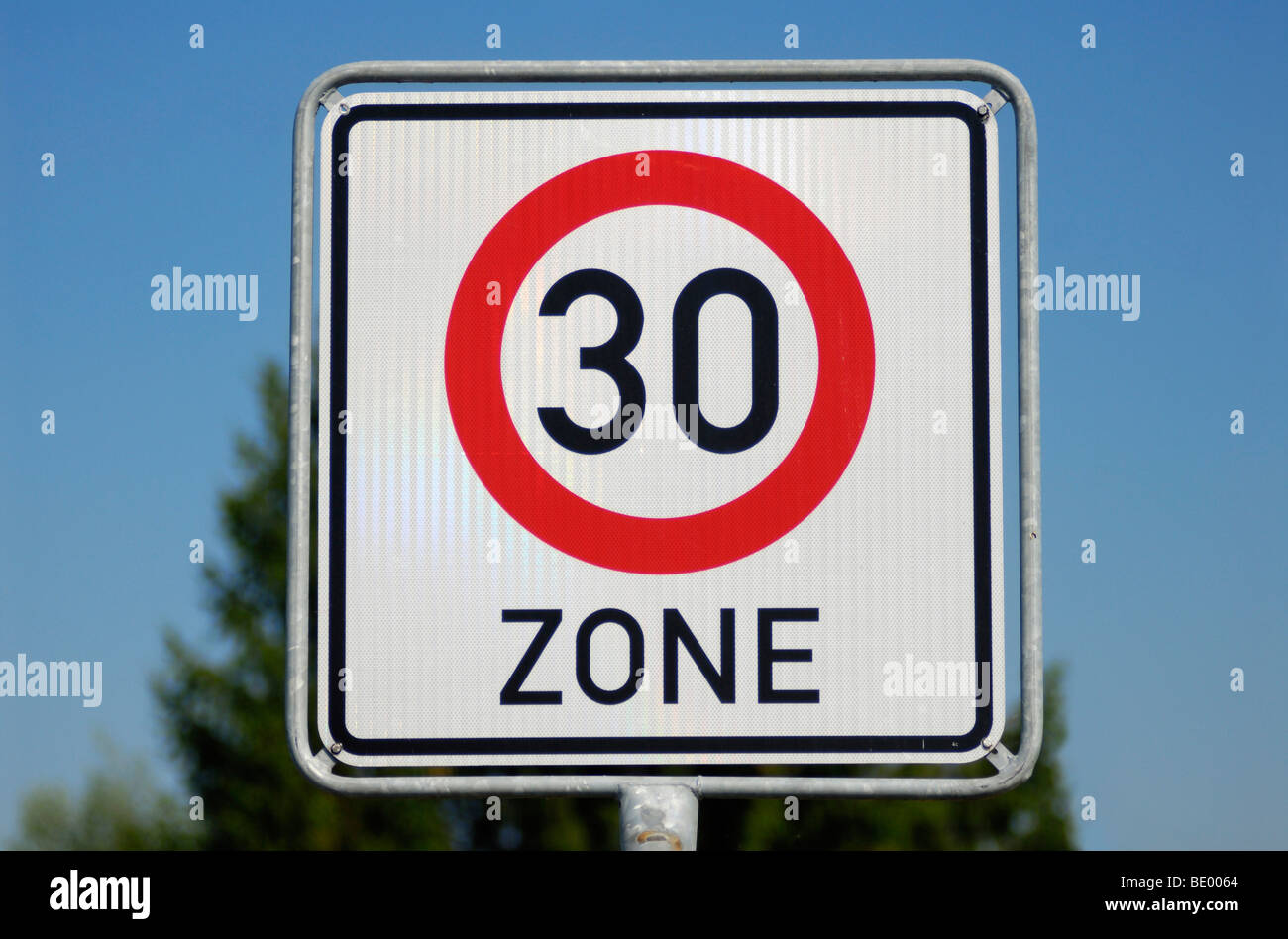 Speed limit sign of a 30 km/h restriction zone Stock Photo - Alamy