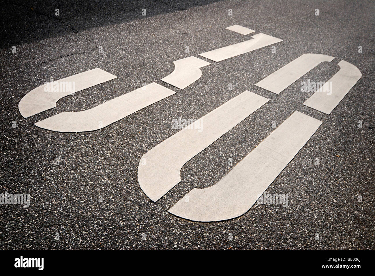 30 km/h restriction zone marking on a street Stock Photo - Alamy