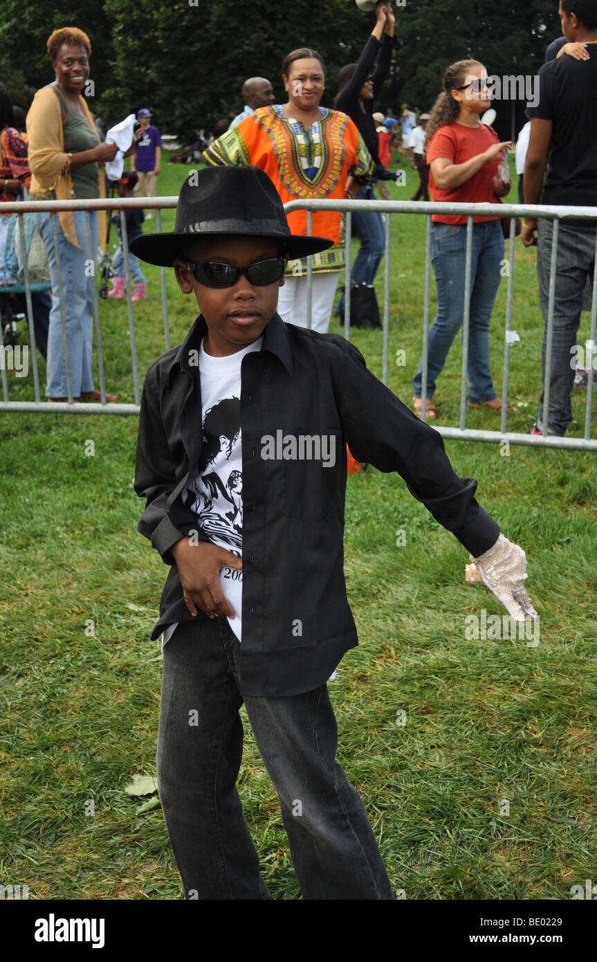 Young boy dances during Michael Jackson's birthday celebration in ...