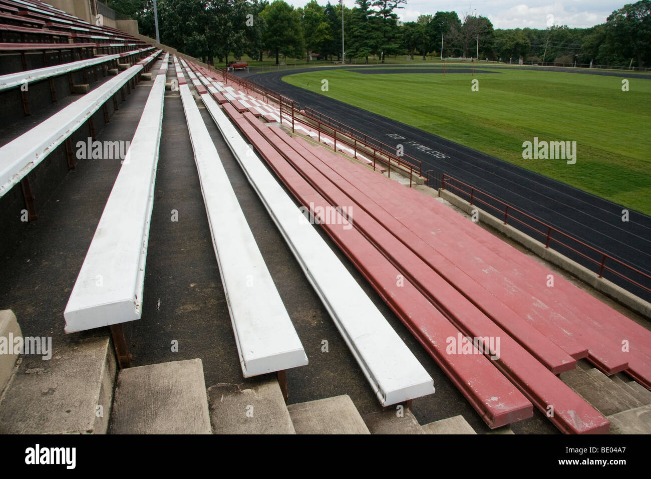 Empty stadium bench Stock Photo - Alamy