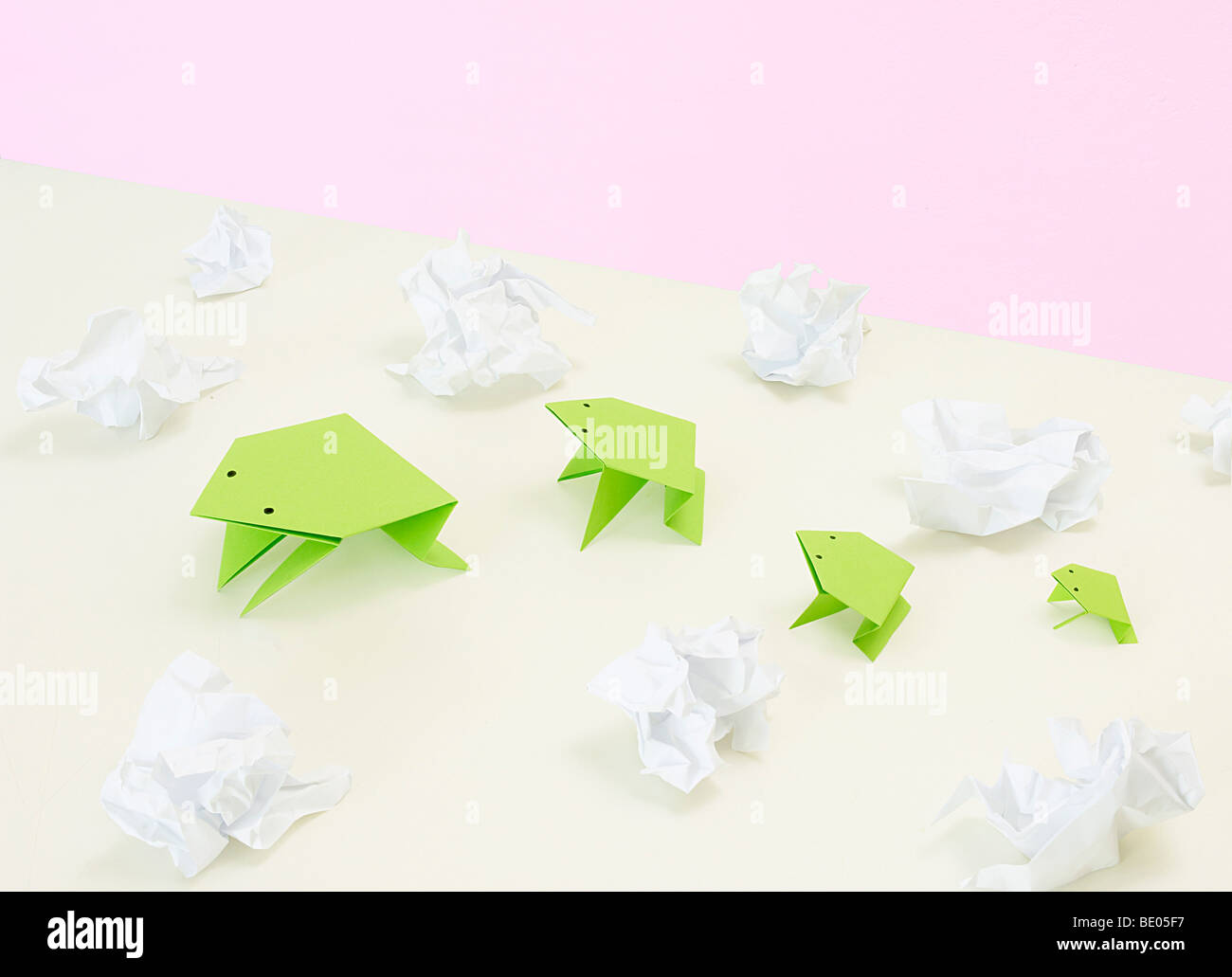 origami frogs amidst scrunched paper Stock Photo - Alamy
