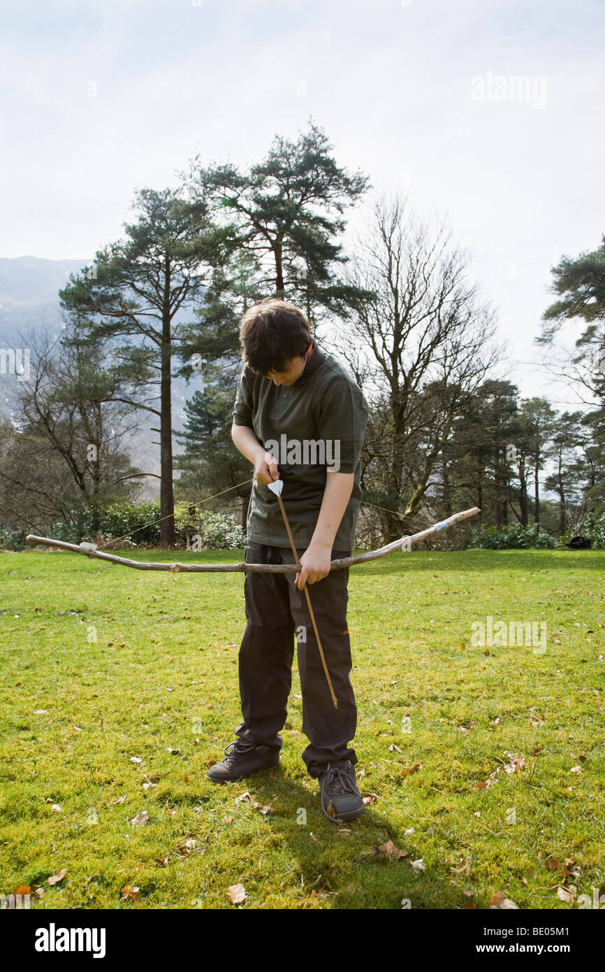 Boy with bow hi-res stock photography and images - Alamy
