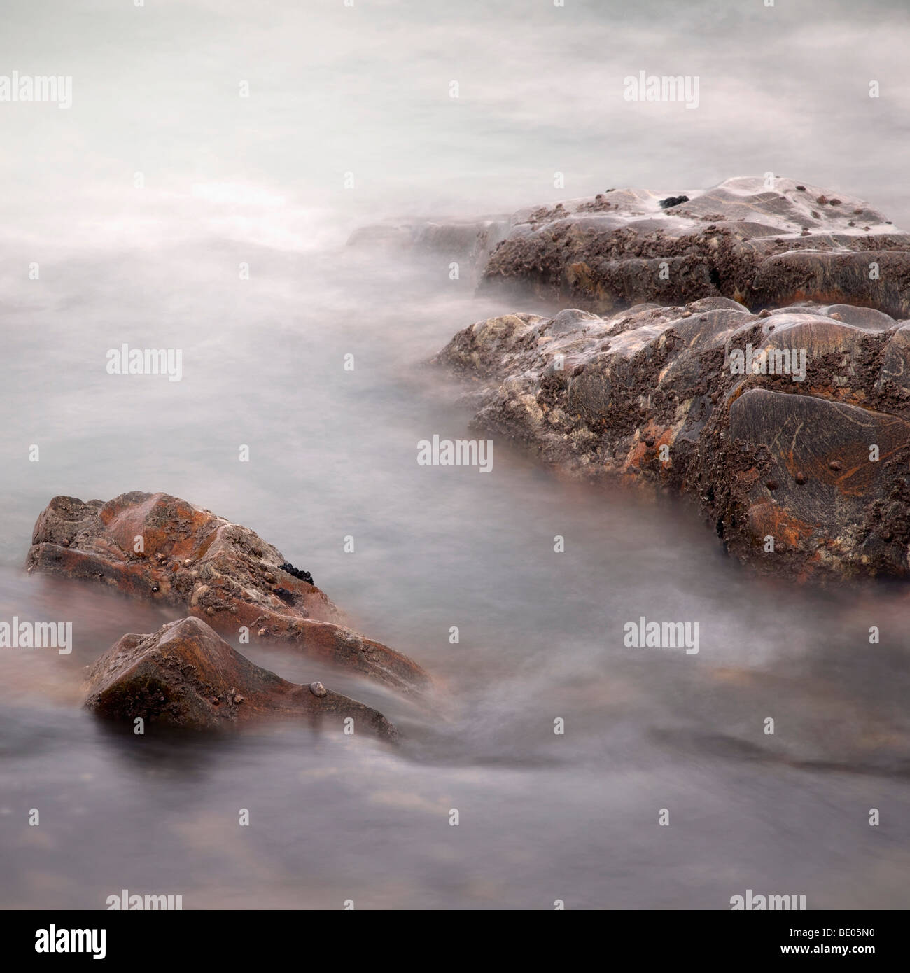 Rocks in sea Stock Photo - Alamy