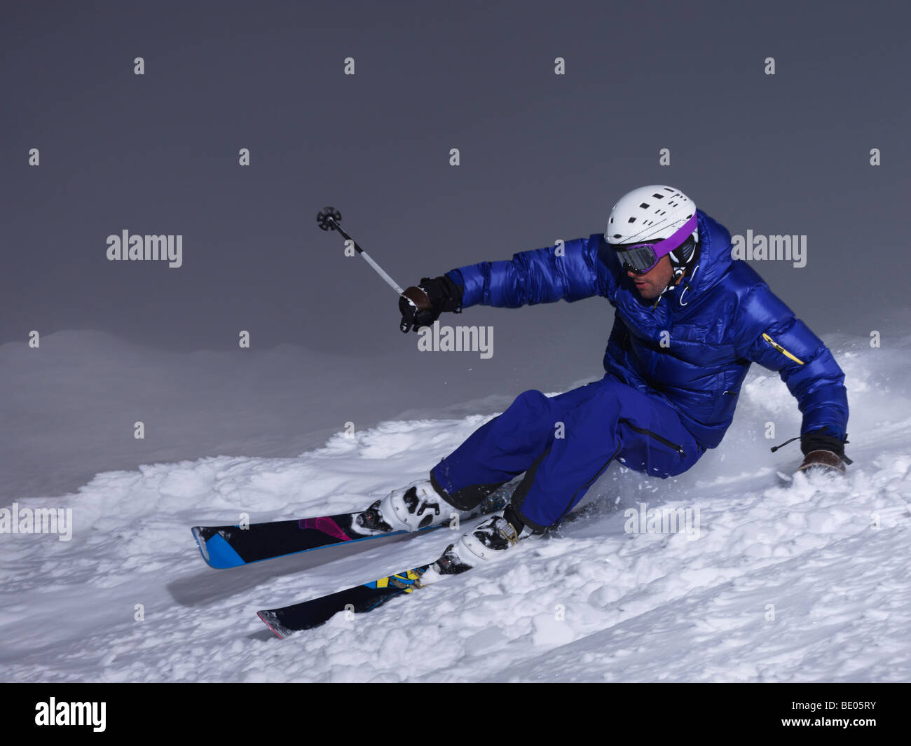 Man carving on slope Stock Photo - Alamy