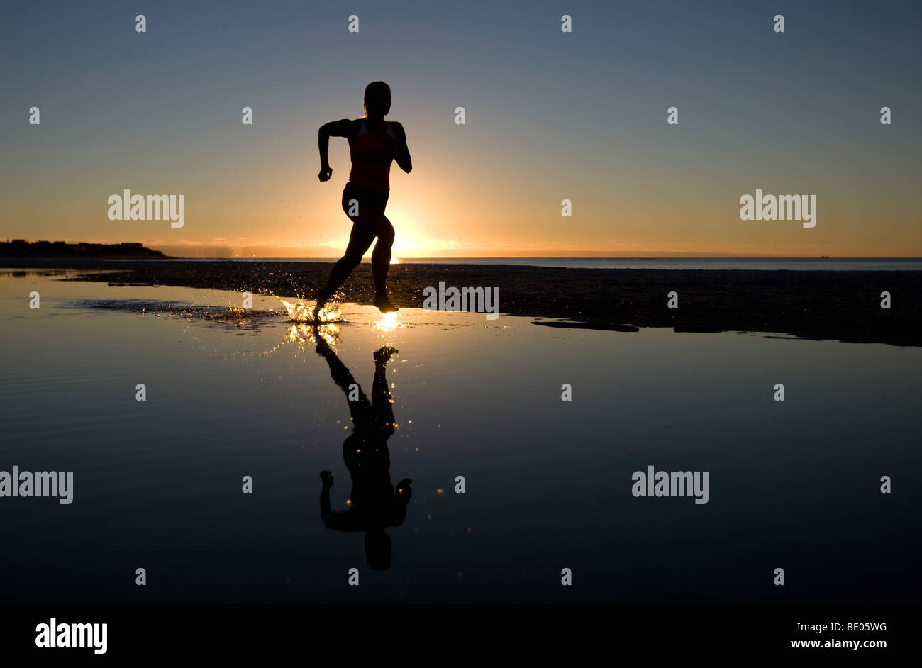 Silhouette young woman wading hi-res stock photography and images - Alamy