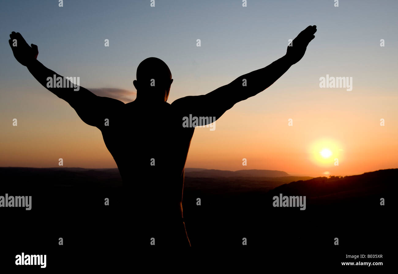 Bodybuilder Poses at Sunset Stock Photo - Alamy