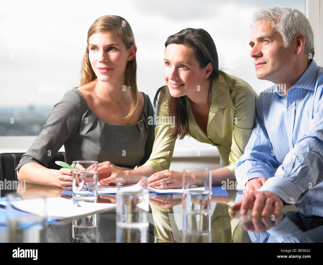 Business partners at a reunion Stock Photo - Alamy