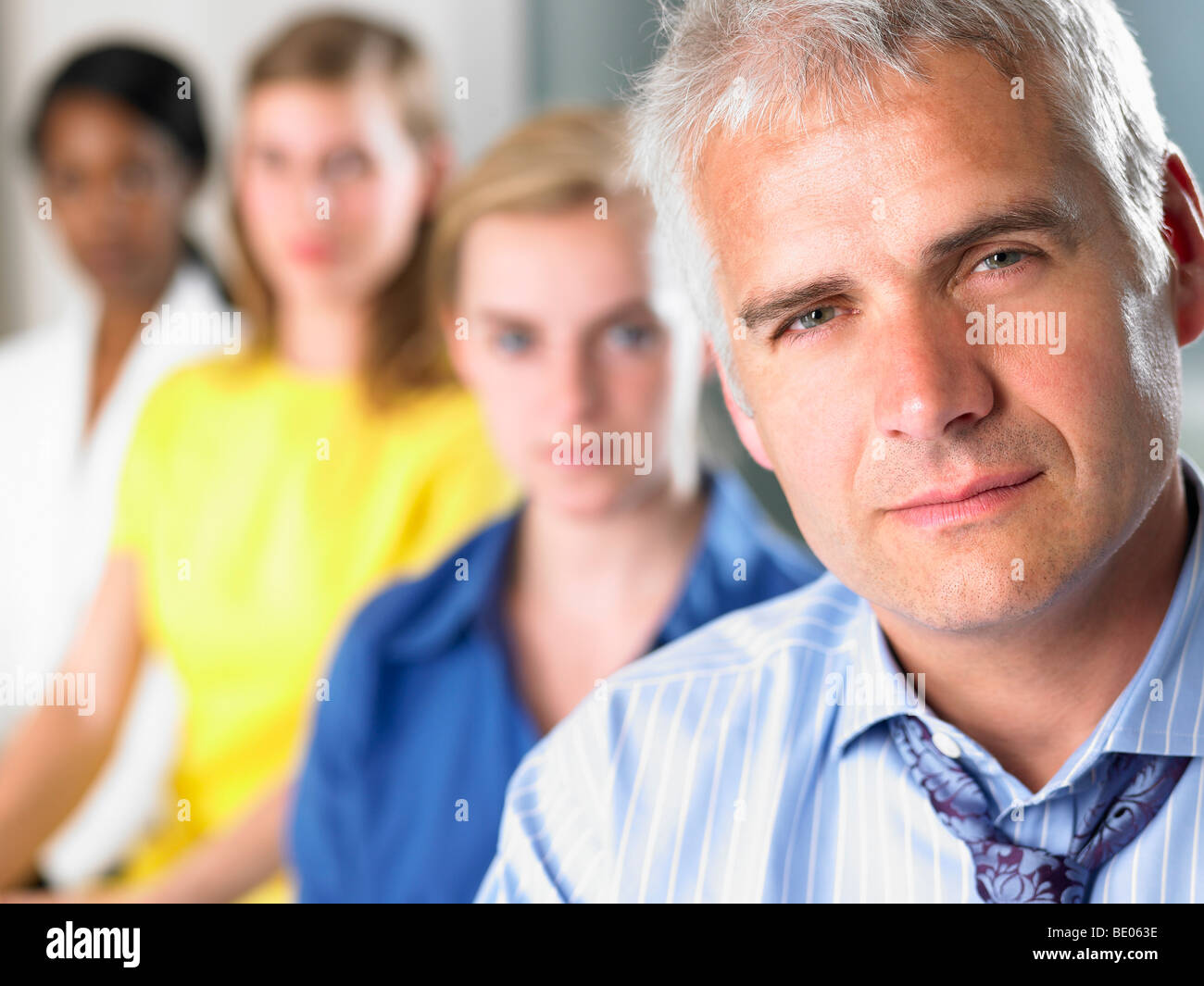 Serious business team posing in hi-res stock photography and images - Alamy