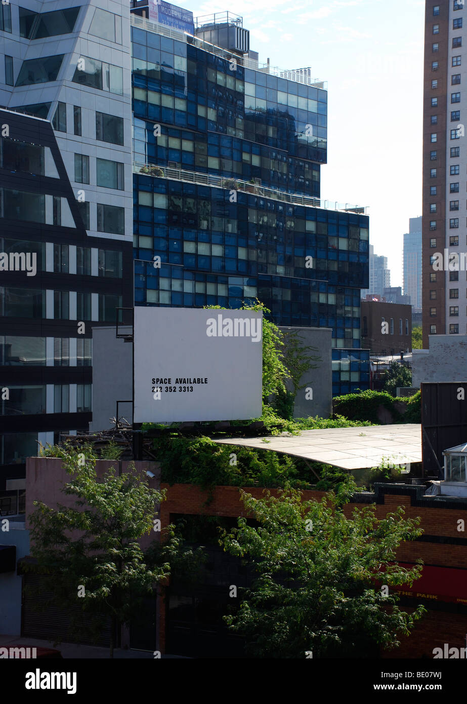 Empty Space Available billboard sign on rooftop among skyscrapers in a ...