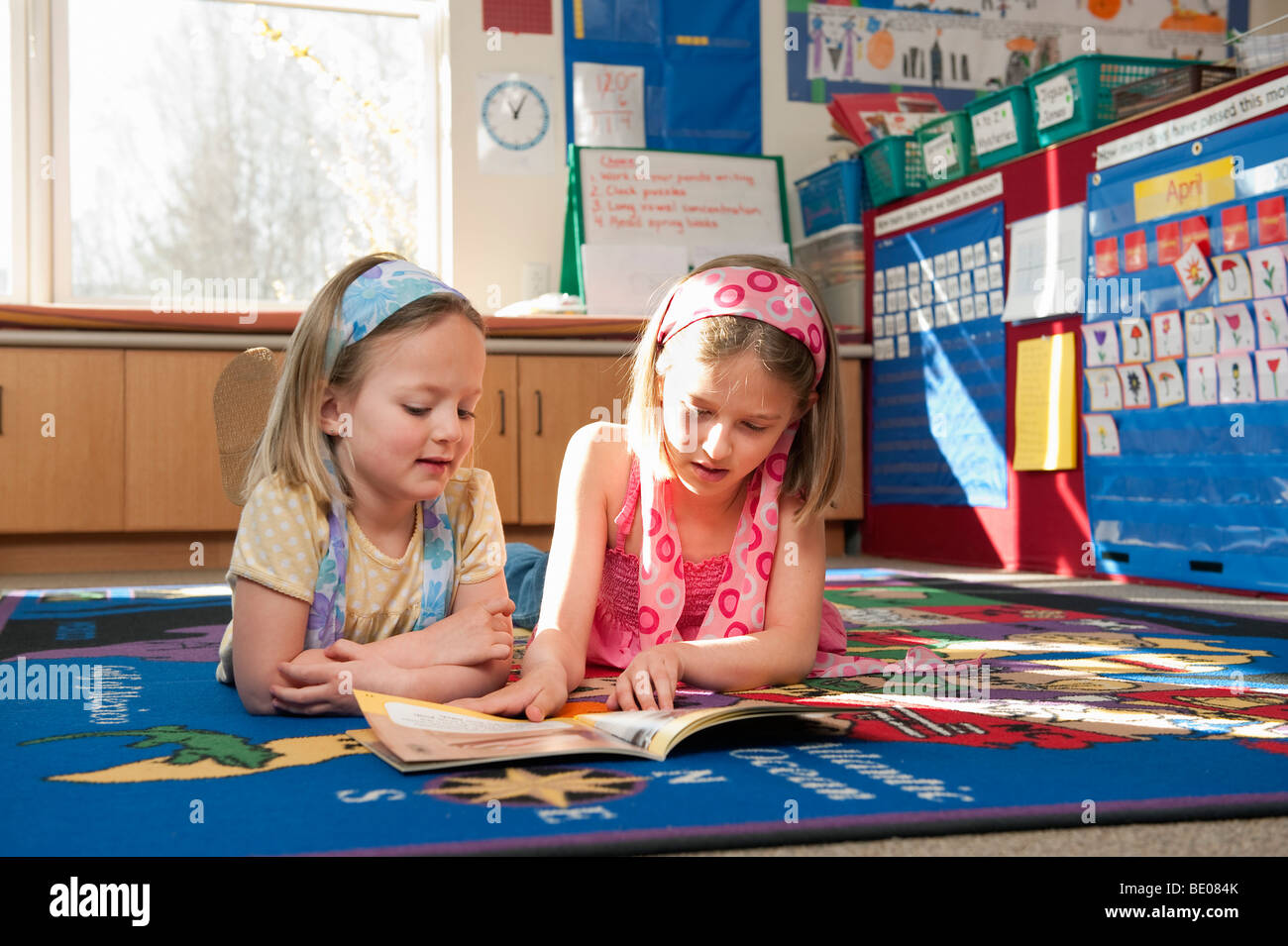Classmate helping friend hi-res stock photography and images - Alamy