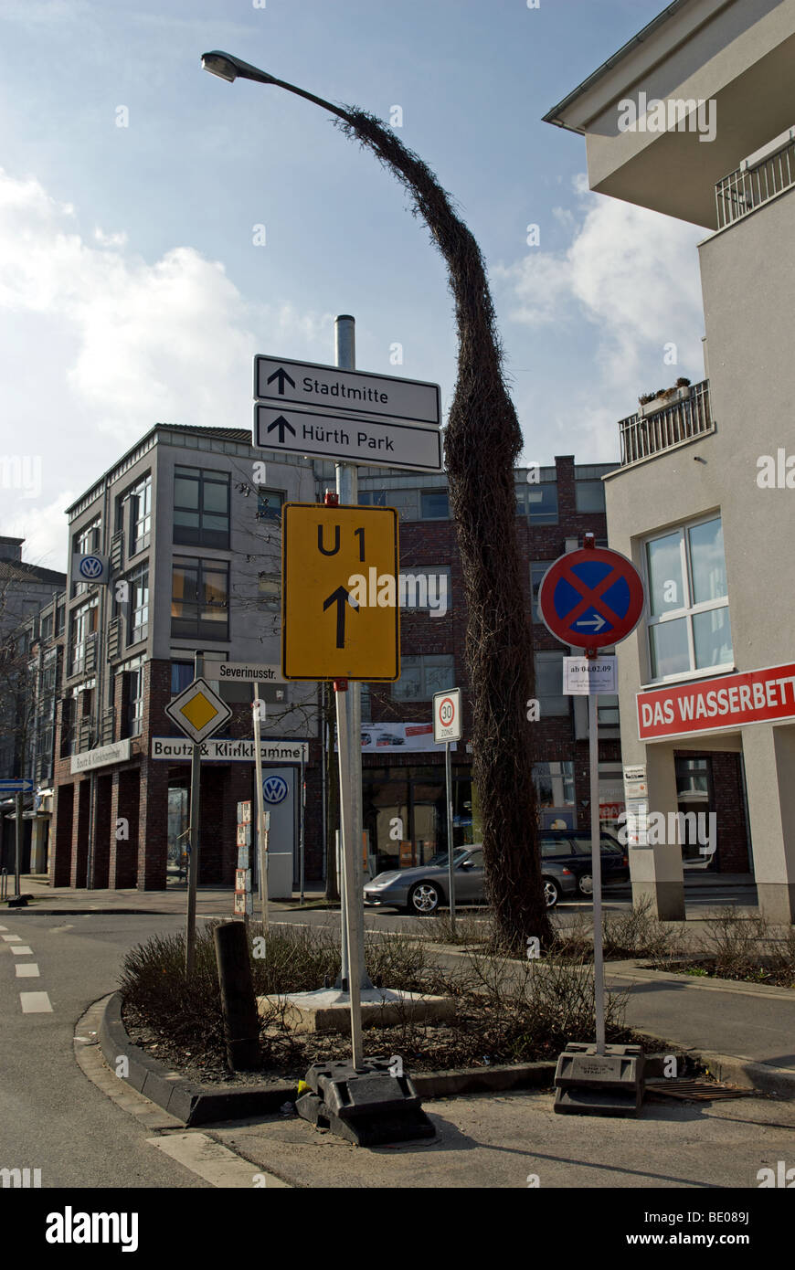 Street lamp covered in foliage, Hurth, Cologne, Germany Stock Photo - Alamy