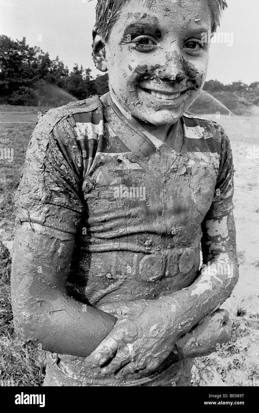 Young Boy Covered in Mud after Football Match Stock Photo - Alamy