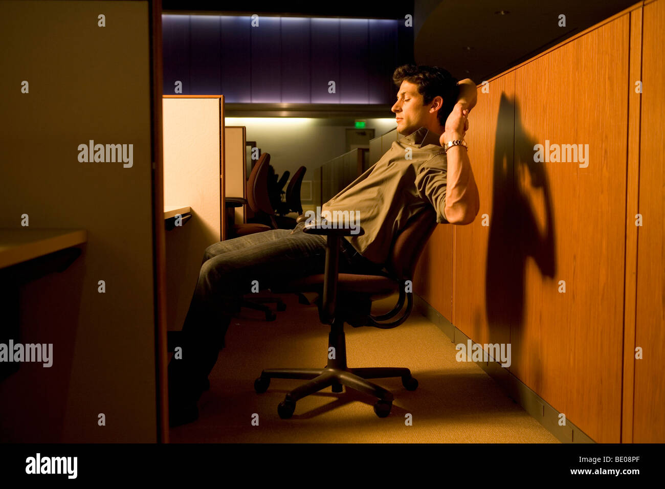Working late in office Stock Photo - Alamy