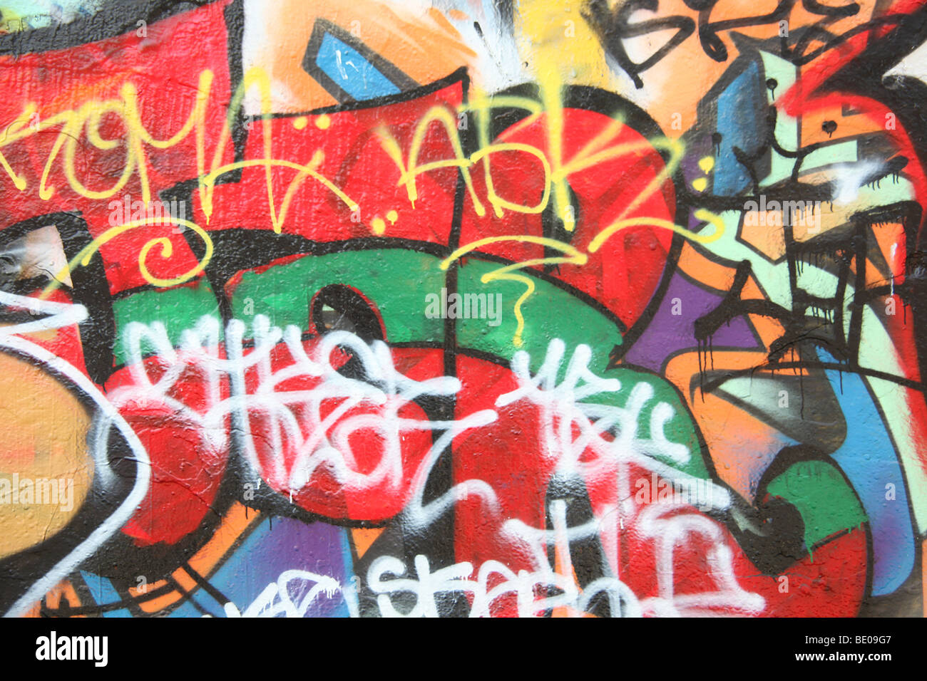 Graffiti spray painted on a wall Stock Photo - Alamy