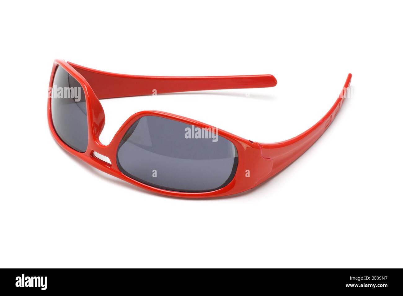 Red toy sunglasses on white background Stock Photo - Alamy