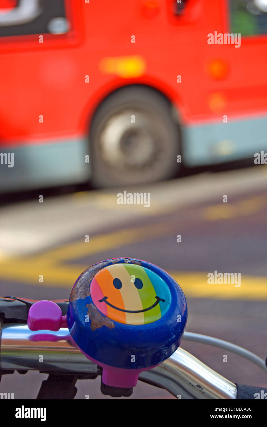 smiley face bike bell on bicycle handlebars Stock Photo - Alamy
