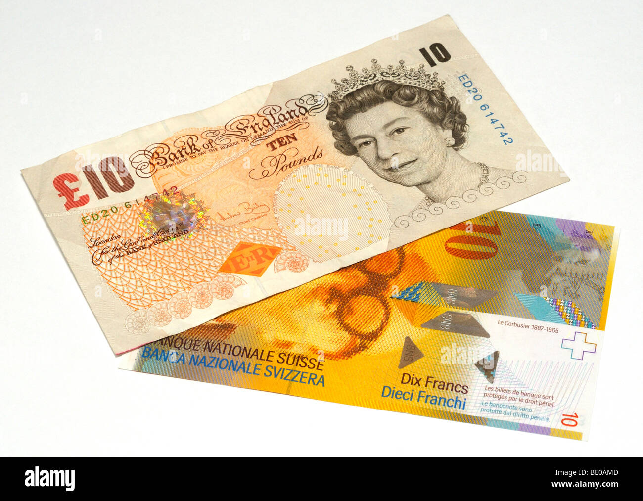 UK Ten Pound Note and Swiss Ten Franc Bank Note Stock Photo - Alamy