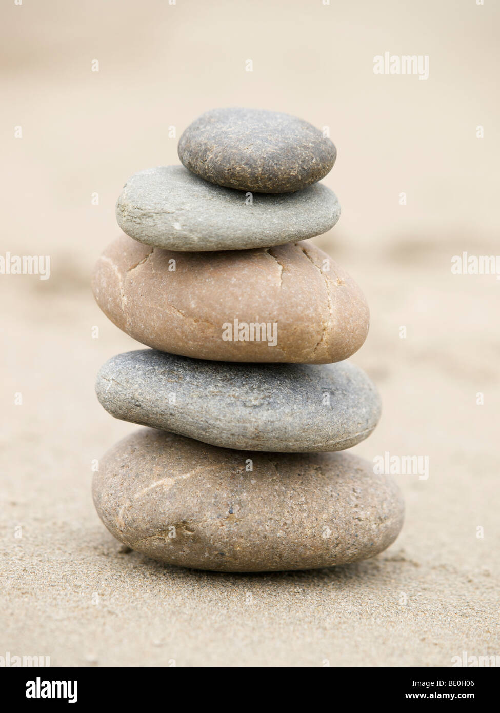 Tower of round stones pebbles stacked in balance Stock Photo - Alamy