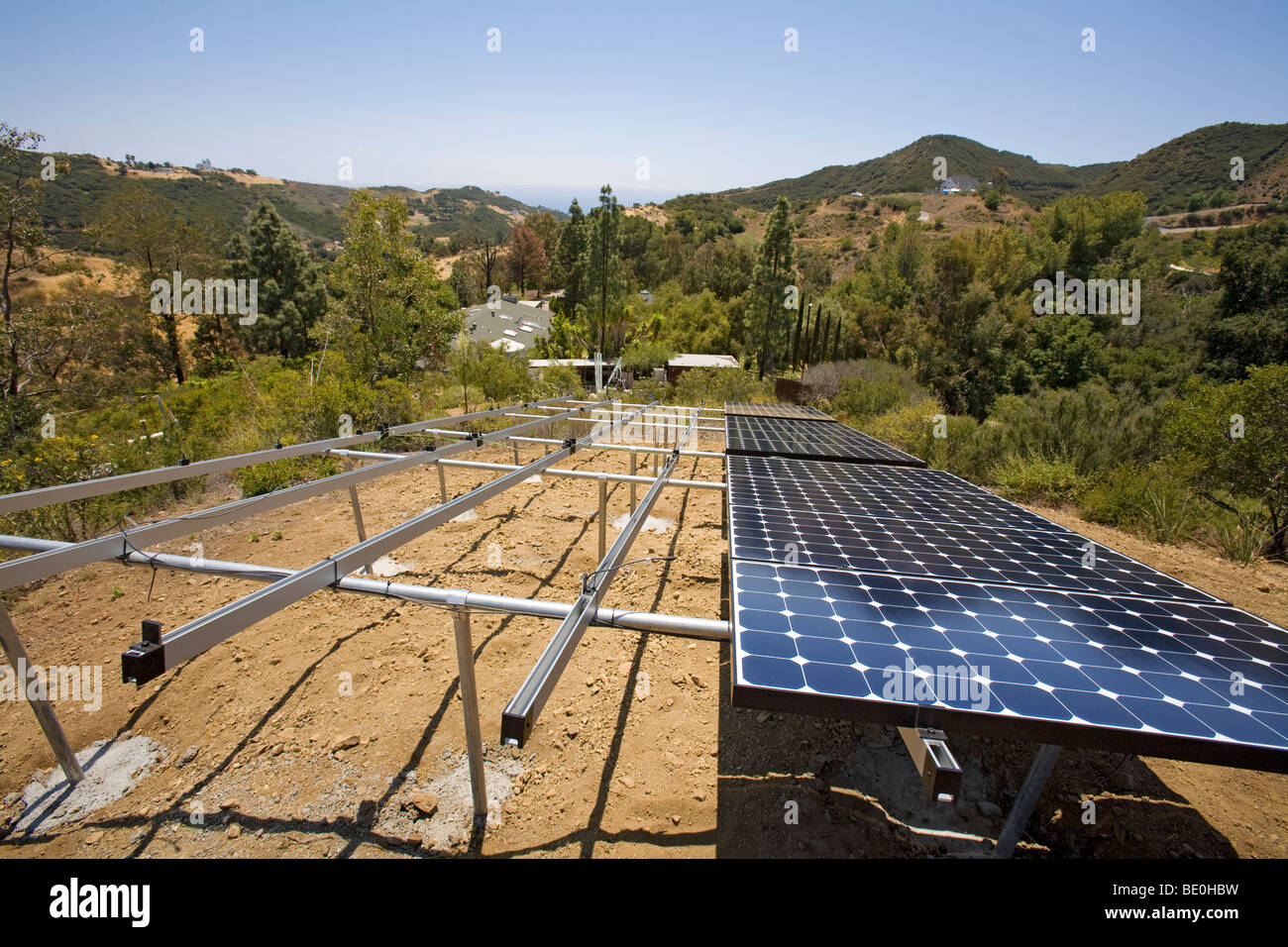 In progress installation of a residential grid-tied solar array on a ...