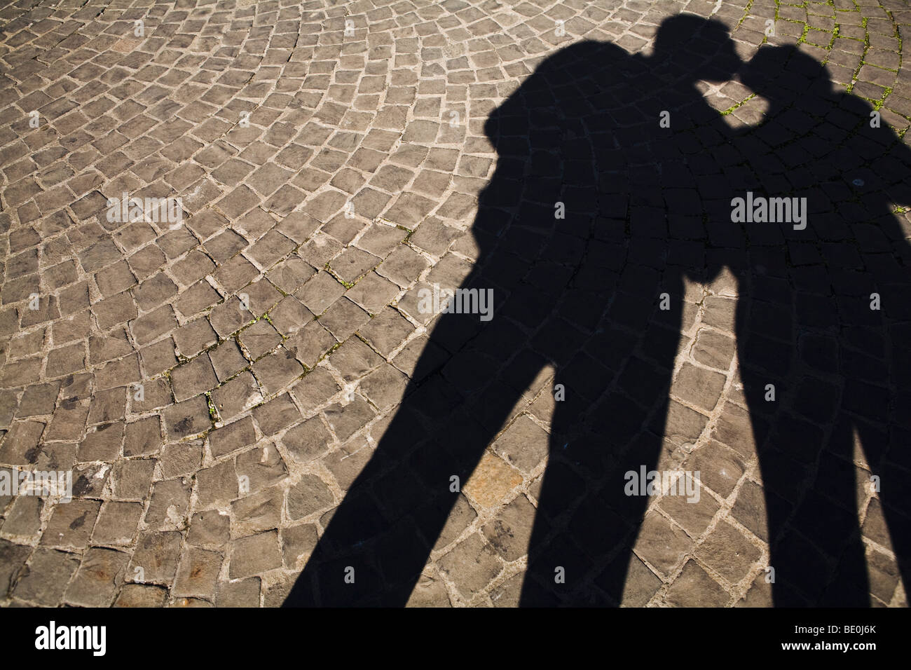 Rome, Italy; Shadows of romantic couple kissing Stock Photo - Alamy