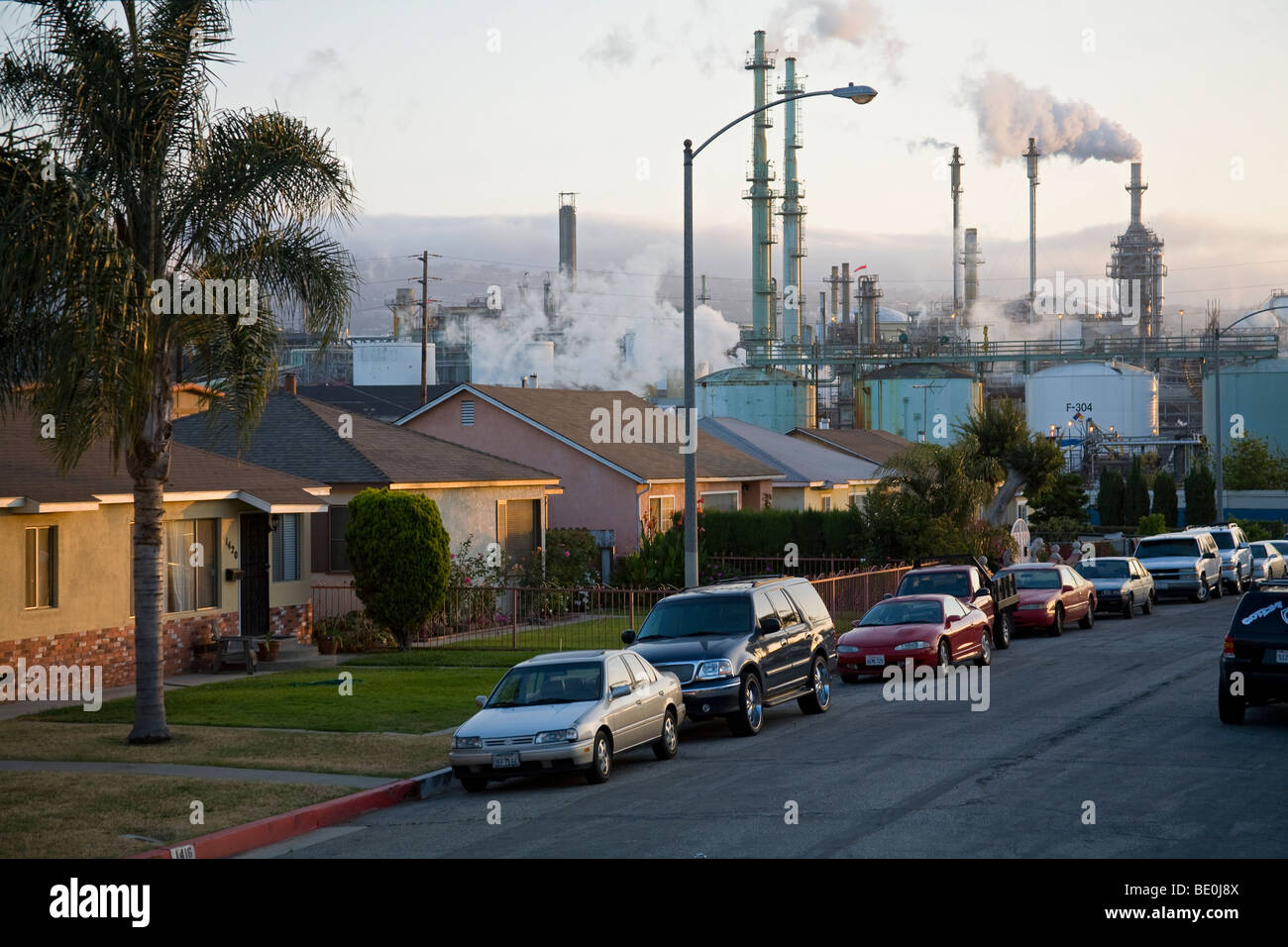 Residential houses next to oil refinery at Wilmington. Los Angeles ...