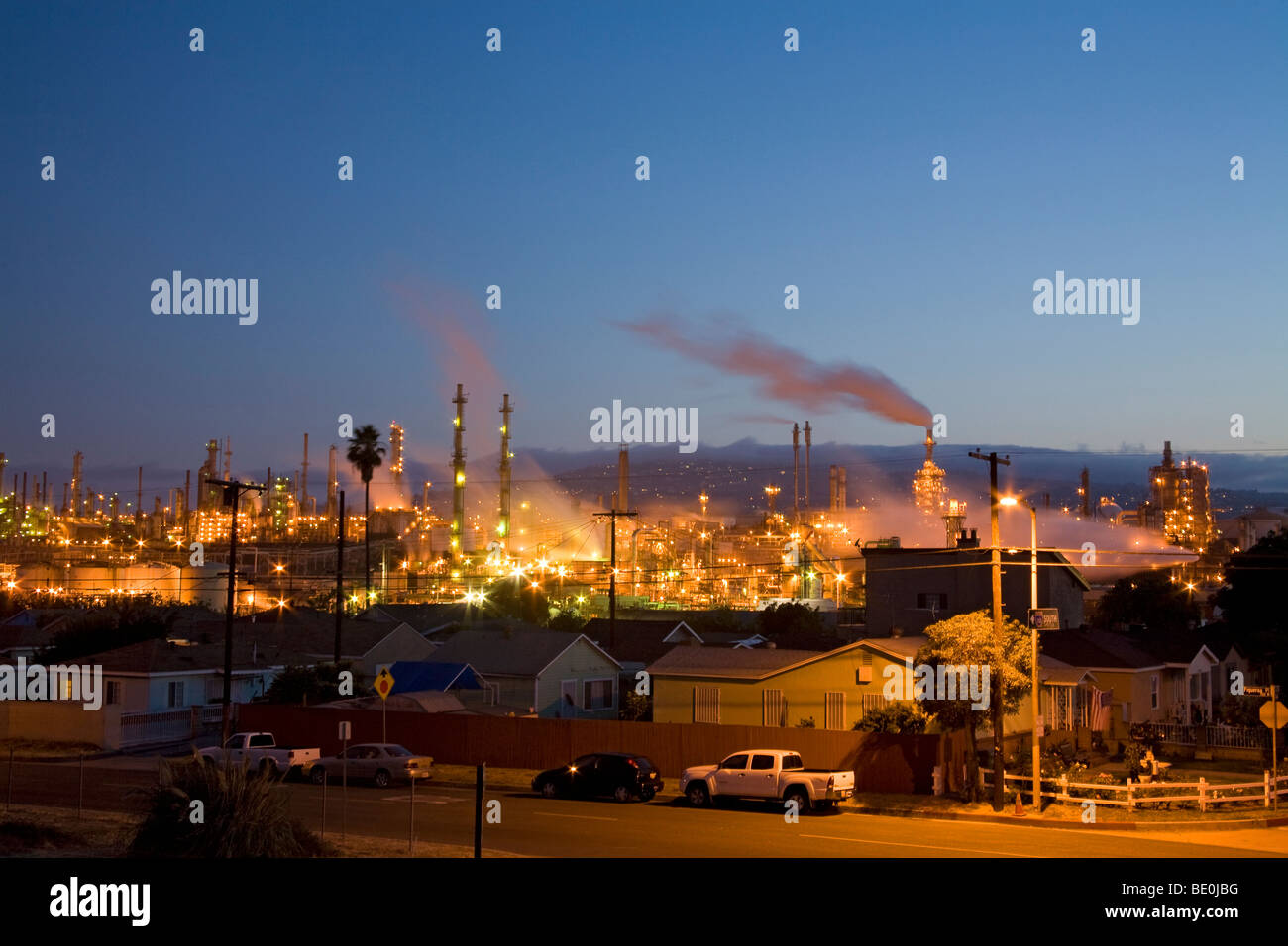 Residential houses next to oil refinery at Wilmington. Los Angeles ...