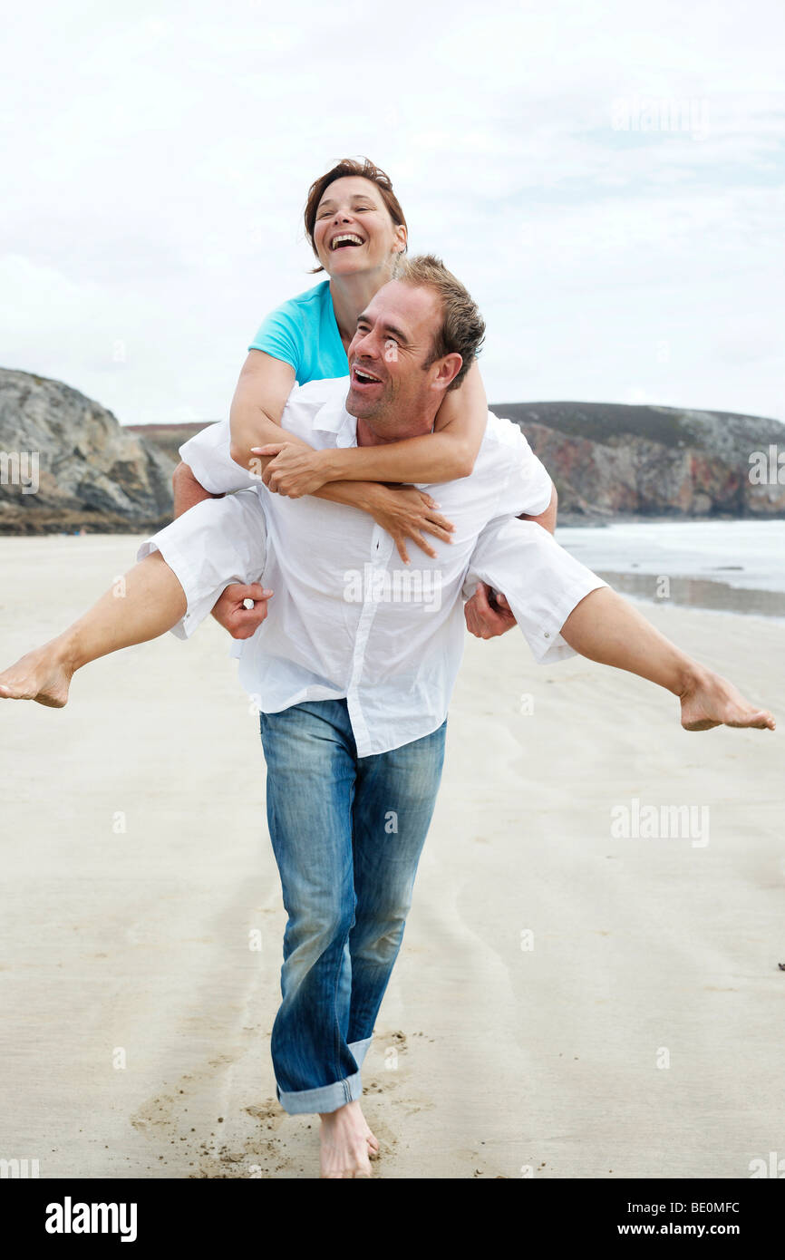 Piggy back adults hi-res stock photography and images - Alamy