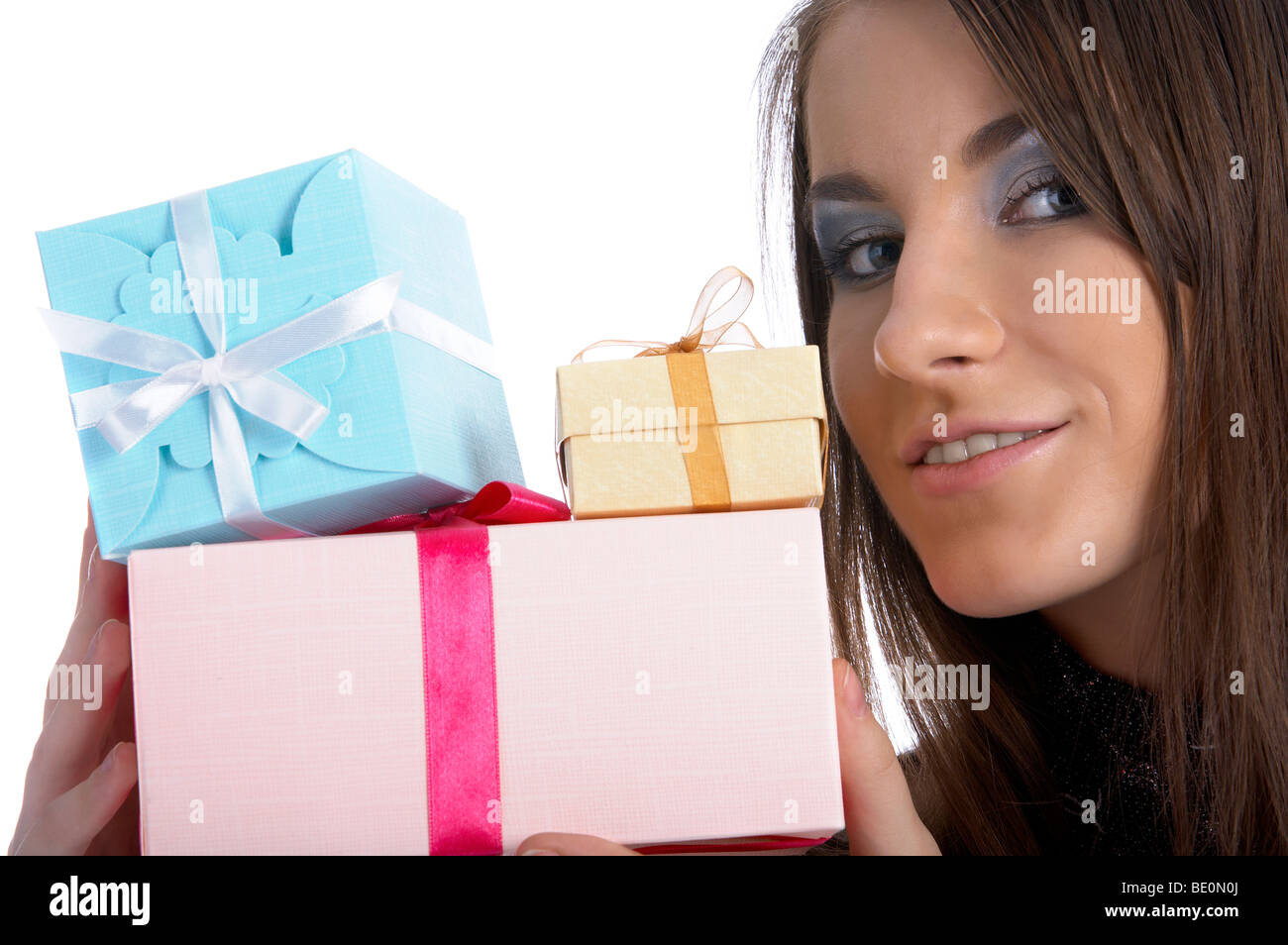 beautiful brunette model with gifts smiles Stock Photo - Alamy