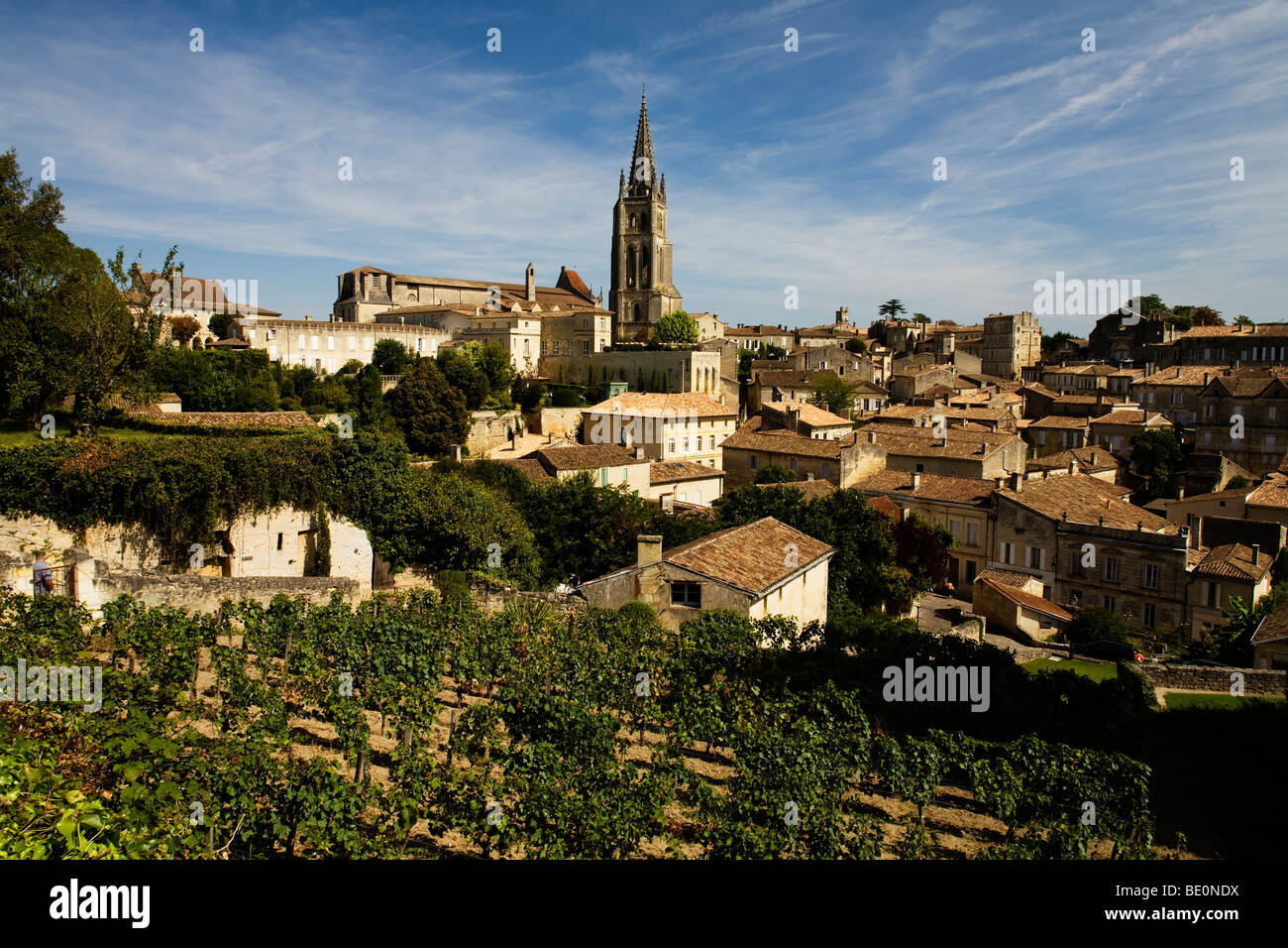 The bell tower of the church of St Emilion dominates the skyline over ...