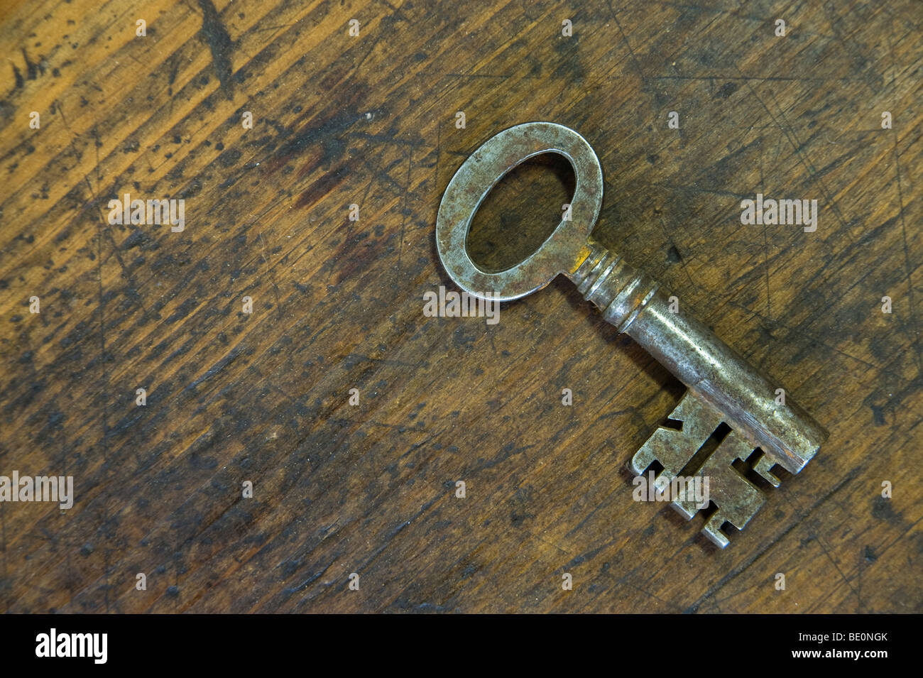 Close up image of an old key against wood grain from above Stock Photo ...