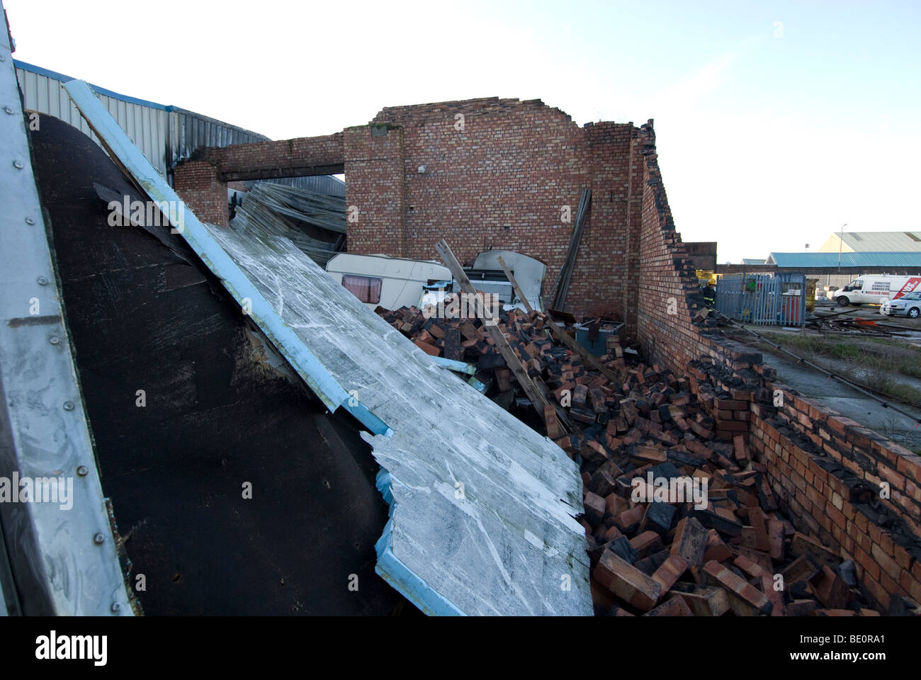 collapsed warehouse brick wall after factory fire Stock Photo - Alamy