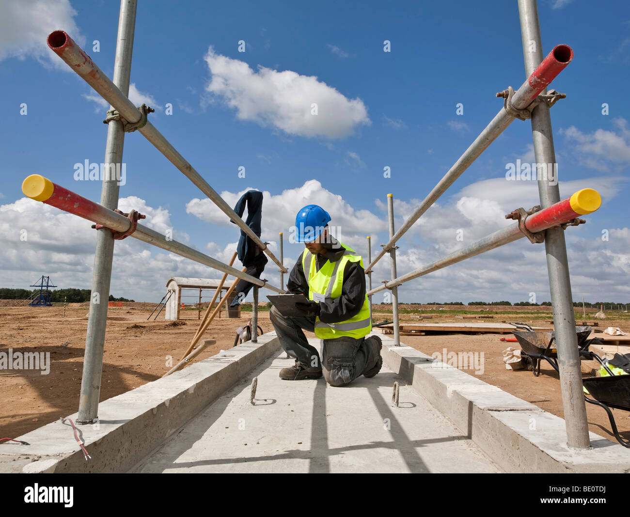 Site worker on temporary bridge Stock Photo - Alamy