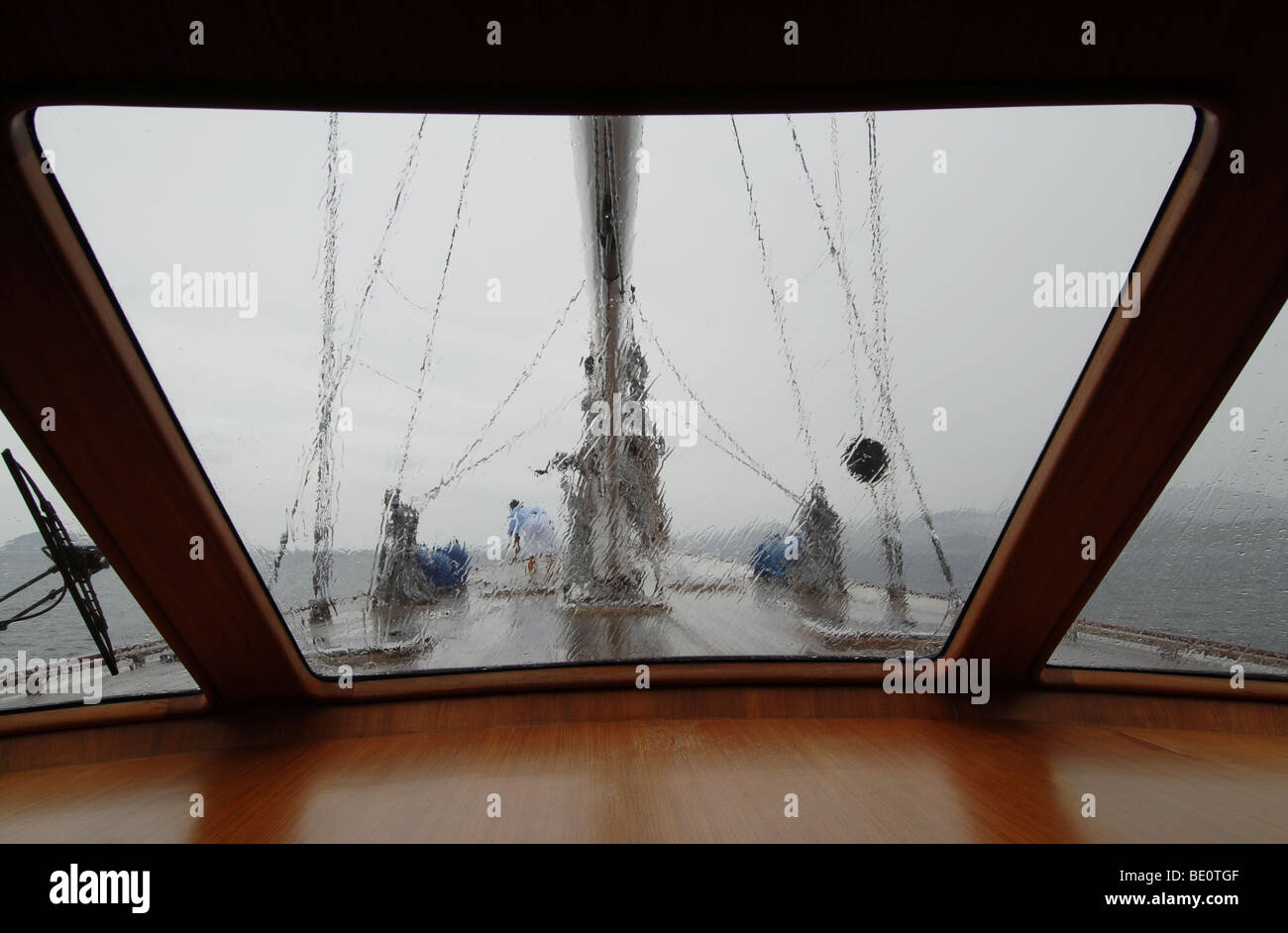 wooden sailboat sailing in the rain Stock Photo - Alamy