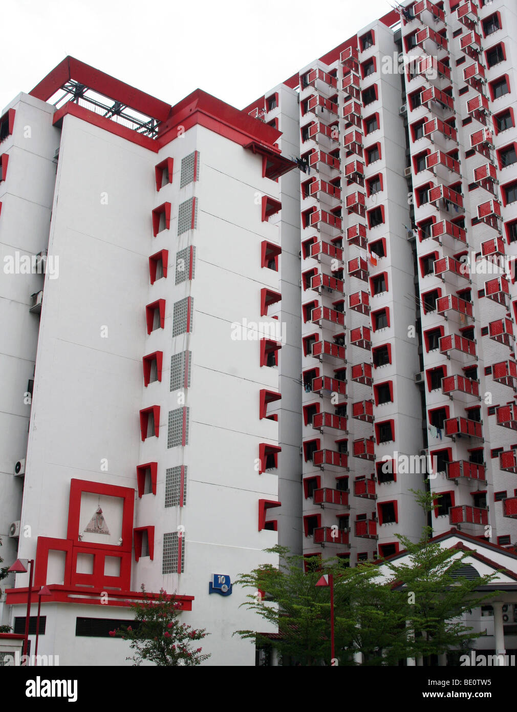Singapore residential tower block with white & red cladding Stock Photo ...